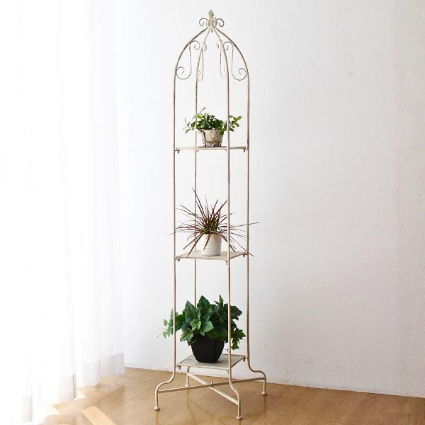シャビー風のアイアンとやわらかな曲線のシルエットがフレンチガーデンのような佇まいをつくるアイアンの3段スタンドトップの飾りやアイアンのライン小花柄の棚板が軽やかなアクセントになっています高さのあるアイアン棚は室内のグリーン用スタンドとしては...