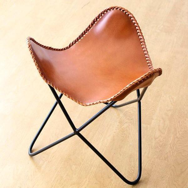 アイアンの骨組み（脚）に本革のシートを被せたデザインスツール革の持つ独特の味わいと無機質なアイアンの組み合わせが落ち着きのあるかっこよさを演出リビングの一角にちょっと置いておきたい、そんなインテリアアイテム商品名 ： レザーバタフライスツー...