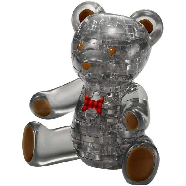 このパズルは透明のピースを組み上げる立体ジグソーパズルです。完成すると、クリスタルのように美しく輝くインテリアとして楽しめます。シールを貼るとブリティッシュなベアが出来上がります。