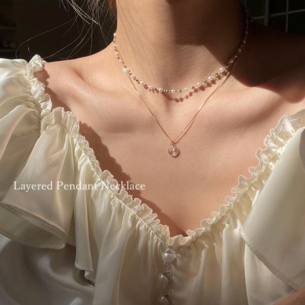 フェイクパール アクセサリー ジュエリー 重ね付け ゴールド おしゃれ 誕生日プレゼント 女性 大人上品 ペンダント首飾り きれいめ 華奢オシャレ新作 韓国ファッションデコルテを上品に引き立ててくれる大人っぽい二連ネックレス。ゴールドの輝き...