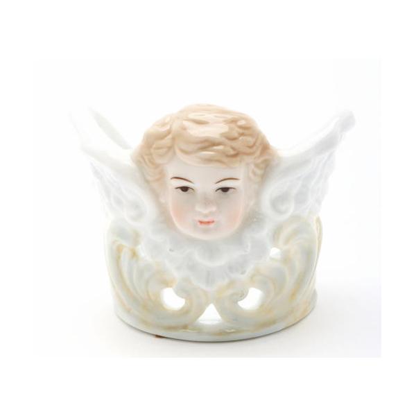 天使のヴォティーブ キャンドル ホルダーです♪下部の透かし彫り部分から灯りが漏れて綺麗です。アメリカ製の白無臭のキャンドル10個付き！サイズ(cm)：　縦１０．５X横９材質：　ポーセリン（陶磁器）