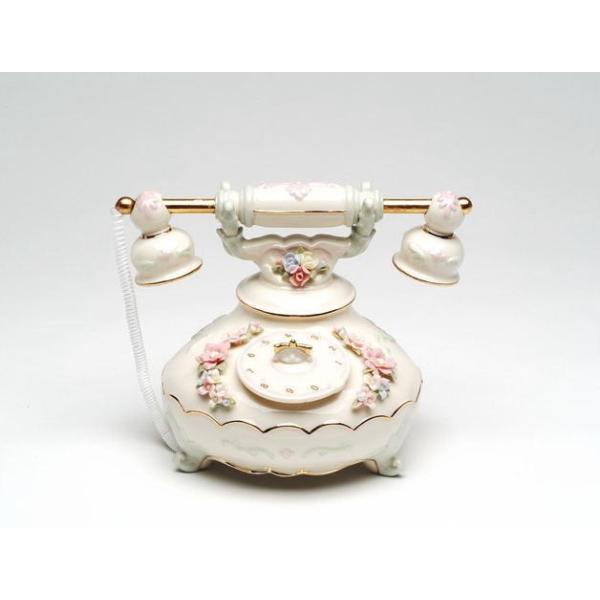 お花で飾られた、ヴィンテージ型の電話機を模ったオルゴールです♪サイズ(cm)：　縦１３X横１６材質：　ポーセリン（陶磁器）オルゴール曲：　"I Just Called to Say I Love You"