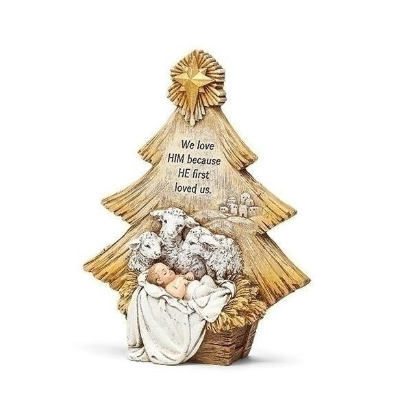 "We love HIM because HE first loved us."「私たちが神を愛することができるのは、神がまず私たちを愛してくださったからなのです。」木彫り風のクリスマス型の置物には、飼い葉おけに眠るベビージーザスの周りに集...