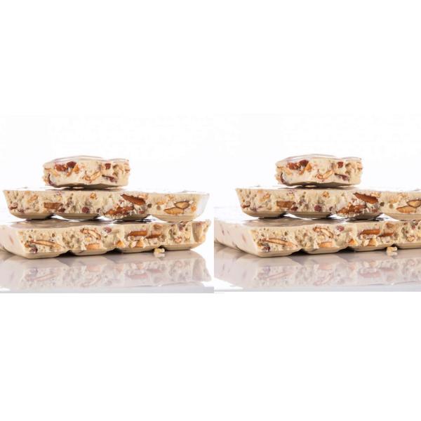 ベルナシオン イヴォワール アマンディーヌ チョコレートに、ココアバター、クラッシュアーモンド、砂糖、ドライミルク、鞘入りバニラを加え、ハニーローストしたスライスアーモンドを練り込みました。 繊細で贅沢な味わいでは、ホワイトチョコレートがお...