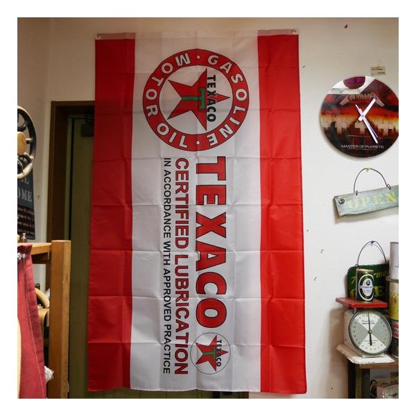 オシャレな空間を演出する、ビッグサイズのTEXACO(テキサコ)タペストリーです。アメリカ雑貨の定番アイテムで、飾るもよし、目隠しラックとして使用など用途は様々です。ナイロン製で見た目の発色もGOOD！サイズ：横1500×縦900mm（約）...