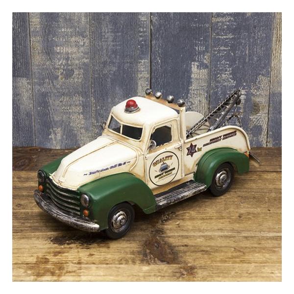 レトロな雰囲気とブリキの素朴感が味のあるアメリカンレッカー車です。今では見かけることの無い、オールドタイプのレッカー車。どこかレトロでノスタルジーな雰囲気があり、ショップやお部屋のインテリアとしておすすめです。サイズ：高さ130×幅280×...