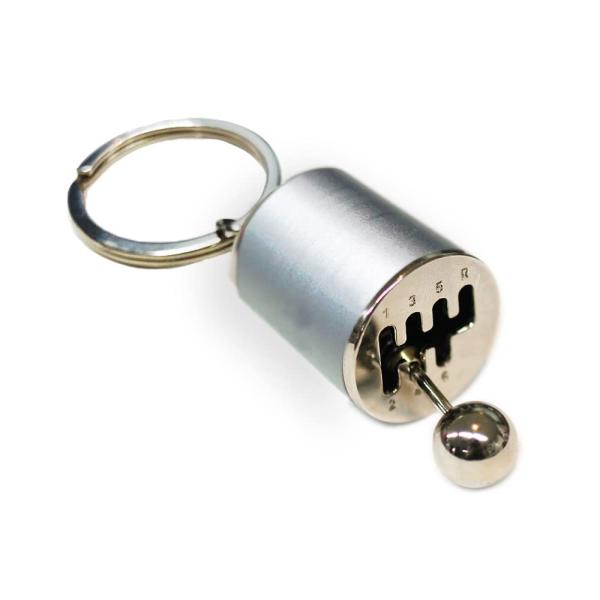 【ご購入後の当店からの連絡はご登録のメールアドレスに通知いたします。必ずご確認ください】【商品概要】ギアシフトをモチーフにしたデザインのキーホルダー6速ギア、自由に変速することができます。全速動く改良版！車のキー、バッグ、その他のアイテムに...