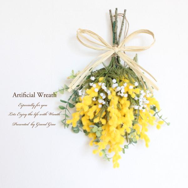 ミモザ スワッグ リース【サイズ】約２5×20ｃｍ（リボンから先端までのサイズ）　【素　材】　アーティフィシャルフラワー（造花）素材はアーティフィシャルフラワー（造花、フェイク）です。ドライフラワーと違いとても丈夫なので玄関外にも飾れます。...