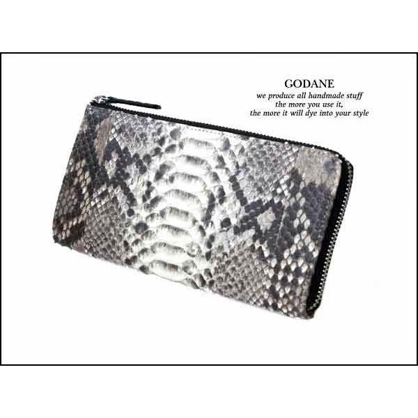 『皮革の宝石』■■GODANE・ゴダン とは■■　熟練職人によるハンドメイドのレザーブランド『ＧＯＤＡＮＥ』。 確かな素材選びと、作品としての仕上がりの素晴らしさに本物志向の男性から支持されています。素材■外側： 天然ダイヤモンドパイソン革...