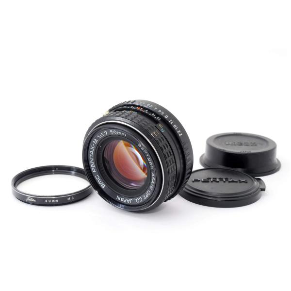 （中古品）SMC Pentax-M 50mm F1.7 マニュアルフォーカスレンズ商品写真はサンプル写真となっております。写真の商品が届くわけでは御座いません。用途機能として最低限の付属品はお送りいたしますが取扱説明書、リモコン等含まれてい...