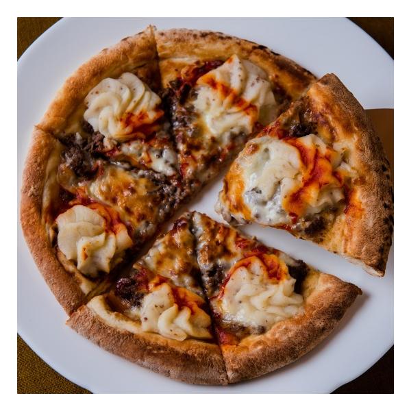 鹿児島県産黒毛姫牛を使用した冷凍ピザです。マッシュポテトと姫牛のミンチが絶妙に合う！プレミアムパワーピザは、お子様にも大人気！解凍後、ご家庭のトースターで焼いてお楽しみください。内容量290ｇ×２枚(21cm)原材料ナポリクラスト（小麦粉、...