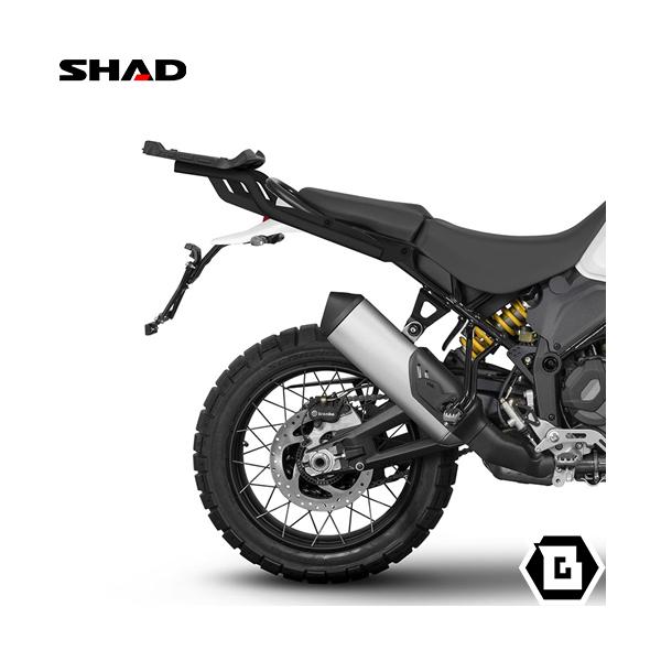 Fixings to mount a suitcase higher than the motorcycle.The SHAD Top Master fixing kit allows you to mount the top case t...