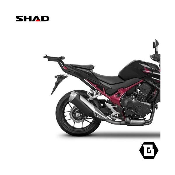 Fixings to mount a suitcase higher than the motorcycle.The SHAD Top Master fixing kit allows you to mount the top case t...