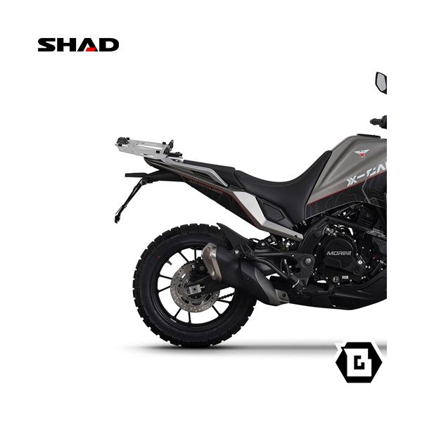 Fixings to mount a suitcase higher than the motorcycle.The SHAD Top Master fixing kit allows you to mount the top case t...