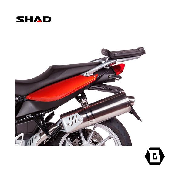 Fixings to mount a suitcase higher than the motorcycle.The SHAD Top Master fixing kit allows you to mount the top case t...