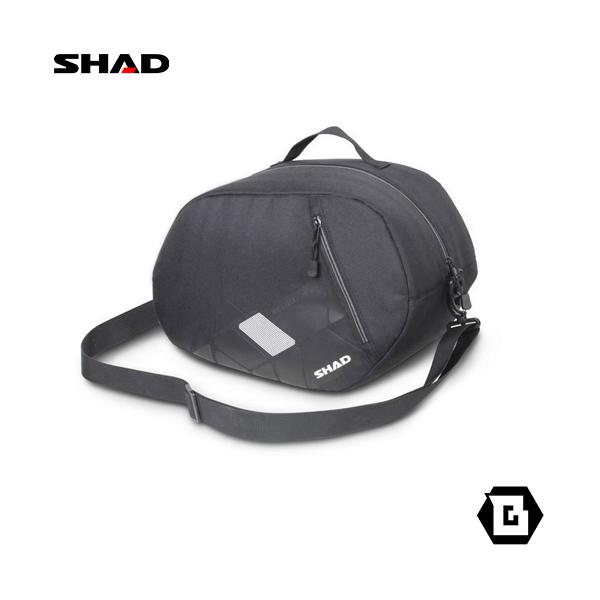 Small semi rigid tank bag with reflective elements to increase security. With a mobile phone compartment with touch scre...