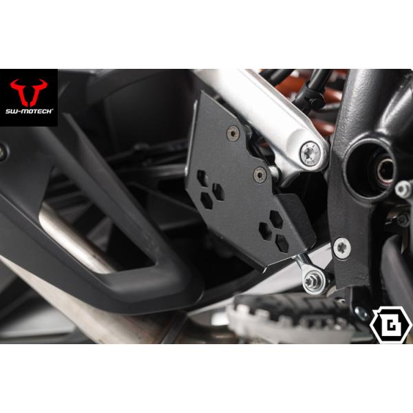 Brake pump protectionThe folded and laser-cut aluminum protector protects the foot brake cylinder - even against unwante...