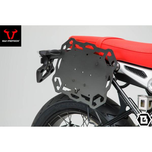 Universal side bracket leftWhether skateboard, swimwear or RotopaX canister - the side bracket, mounted with a single cl...