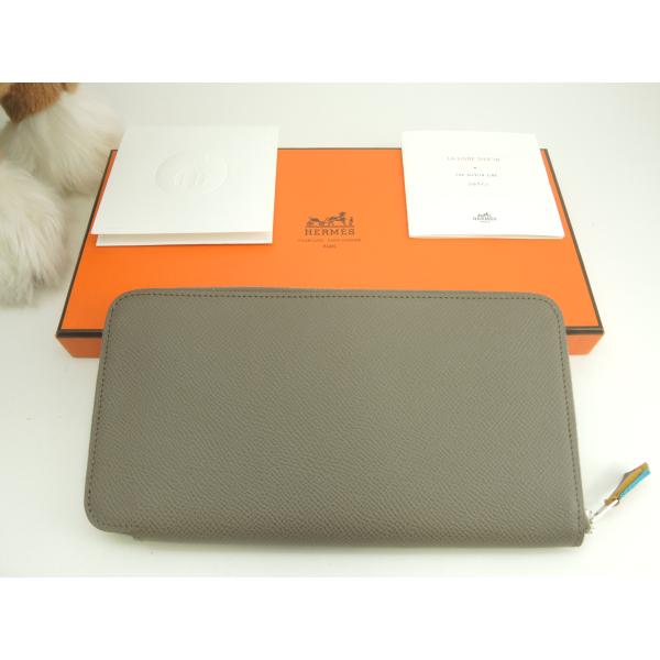 品名 : ラウンドジップ長財布　アザップロングシルクイン　ロングウォレット　ジップアラウンドウォレットメーカー : エルメス (HERMES)型番・素材 : ヴォーエプソンレザーライン・色 : グリエタン　シルバー金具参考定価 : 未確認サ...