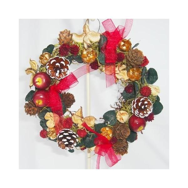 古代ローマ時代に始まったリース、クリスマスムードを盛り上げること請け合い！！１８ｃｍクリスマス、ご結婚祝い、誕生日、記念日のプレゼントにも！無料でラッピングしてお届けします。商品色赤系使用材料プリザーブドフラワーモス・ユーカリ・松笠・木の実...