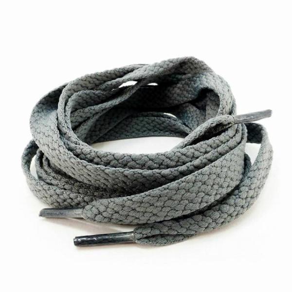 お洒落なくつひも、シューレース飽きてしまったスニーカーも、お気に入りのスニーカーもイメージチェーンジ！幅 約 1.2cm長さ 約 125cm右左１本ずつのセット(１足用)編み込み風の平ひもです。※ 左右で若干長さが違う場合がございますが、ス...