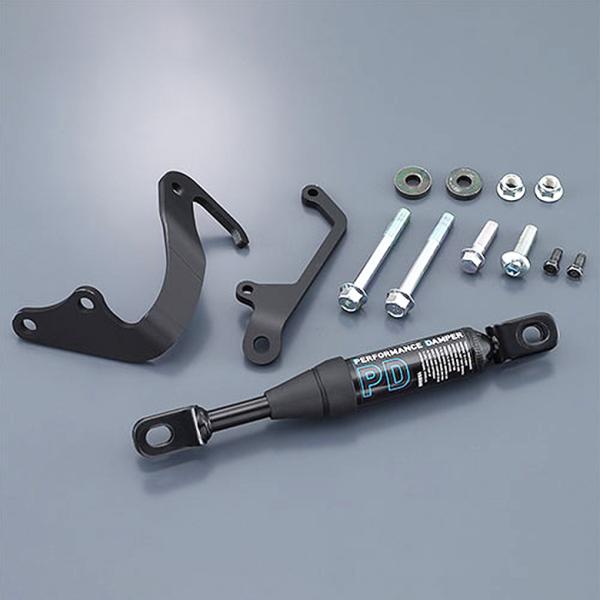・四輪高性能車に装着され定評のある「パフォーマンスダンパー」の二輪専用版。・走行時の車体の変形及び振動をダンパーで吸収し、乗り心地、ハンドリングを向上させます。・取付構造を変更、小型軽量化、かつ減衰力設定を更に最適化し、商品名称も新しくなっ...