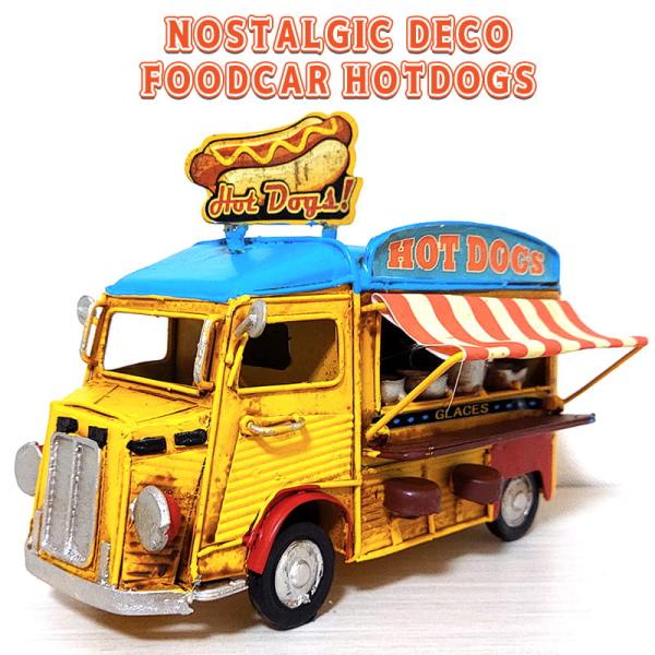 「ノスタルジックデコ フードカー ホットドッグ」レトロなホットドッグフードカーでお部屋をお洒落に変身！鉄でできたレトロな乗り物のオブジェです。カラフルでポップなデザインで玄関のウェルカムスペースをノスタルジックに演出！ビンテージ加工されてお...