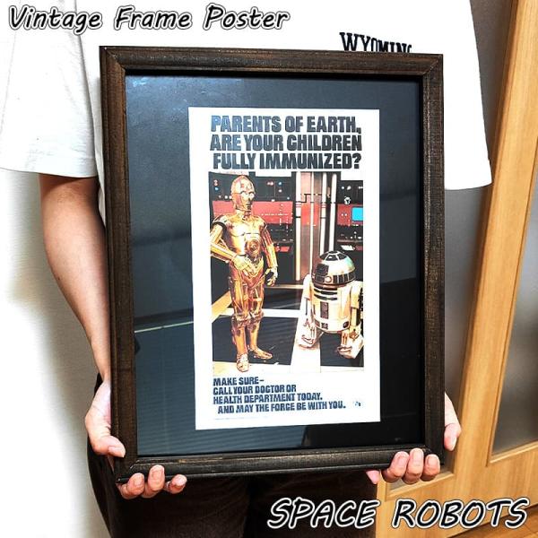 「ビンテージ フレームポスター SPACE ROBOTS」壁に飾るだけでアメリカンな気分になれるポスターフレームです！ヴィンテージ調のウッドフレームとポスターがアメリカンレトロな雰囲気を演出してくれます♪ポスターとフレームが一緒になっている...