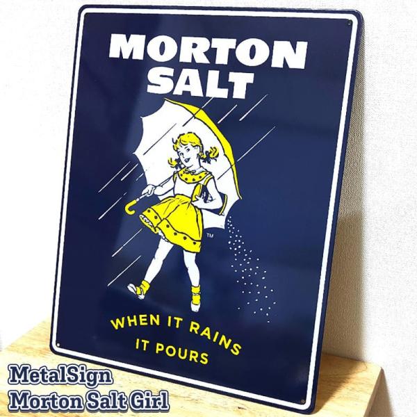 「メタルサイン ”Morton Salt Girl”」アメリカの老舗のお塩屋さん「モートンソルト」のブリキ看板です！キャラクターでもある、傘を差した女の子がレトロでかわいいデザイン。こちらの商品は、正規ライセンス品となっております。-アメリ...