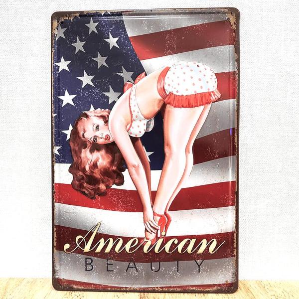 「ブリキ看板 ”American BEAUTY 2”」ハリウッド映画のようなおしゃれなブリキ看板です。お店の飾りにもいかがでしょうか？表面はアンティーク感あるビンテージ加工。傷やサビのデザインが良い味を出しています。これこそオールドアメリカ...