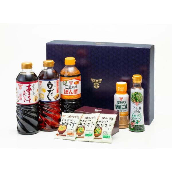 なごみギフトフンドーキン人気商品詰め合わせギフト。あまくておいしい醤油、白だし、ごま風味ぽん酢、にら豚のたれ、深煎り焙煎ごまドレッシング、フリーズドライまろやかみそ汁、フリーズドライまろやか豚汁の7品目（合計8個）入ったバラエティ調味料セッ...