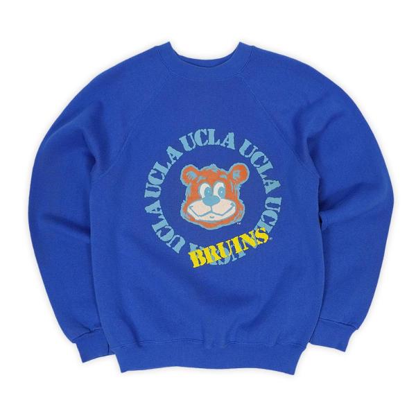 商品名：90s UCLA BRUINS スウェット ラグラン キャラクター USA製 Tultex ビンテージ トレーナー (-7633)表記サイズ：BOYS XL実寸サイズ：着丈(襟元から裾):59cm  身幅(脇下から脇下):50cm ...