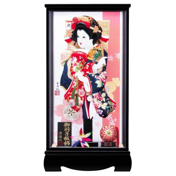 横幅30.5×奥行24.5×高さ58.5cm匠一好作。紺と赤の金彩、正絹手造り押絵羽子板です。高級感のある黒塗りケースにセット致しました。ケースの背景には金蒔絵で桜が描かれています。□羽子板…押絵羽子板　□お顔…正絹手描き面相　□衣装…金彩...