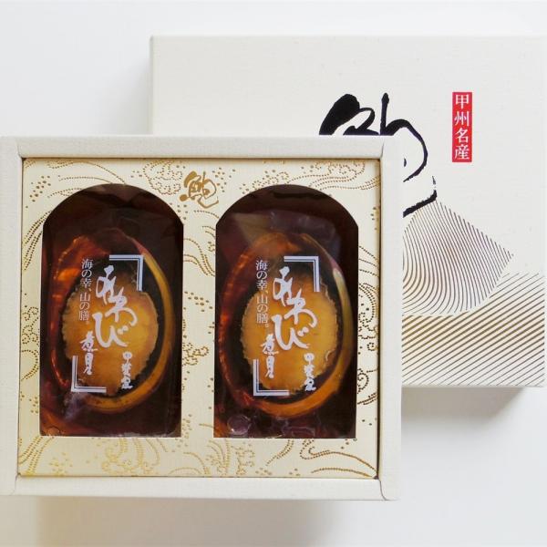 殻付あわびをかいや独自の製法で煮貝に　しました。  シコシコとした心地よい歯ごたえと、それに負けないくらいの  美味しさが自慢です。 薄口のほんのりしょうゆタイプですので、あわび自身の持つ 旨味が活きています。  殻とワタを外し、スライスし...