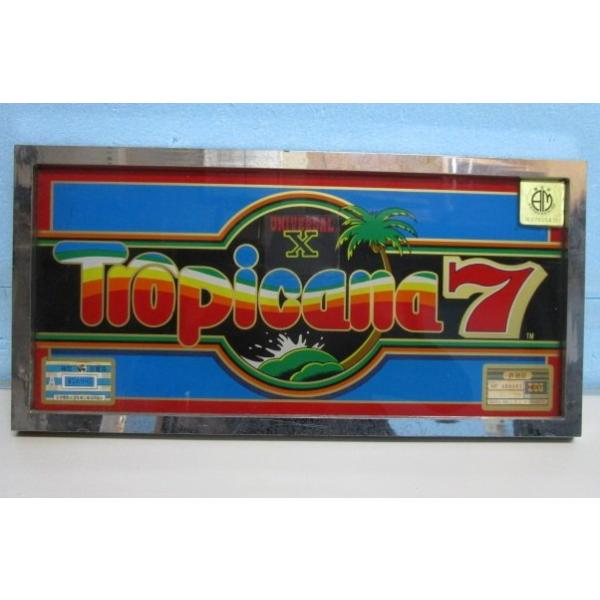 【パチスロ実機のパネル】メーカー：ユニバーサル機種名：トロピカーナ7X中古品ですので多少のキズや汚れ・日焼け・が有る事がございます。 実機から外した古い品物です。絵柄剥がれ・小さなヒビやカケ・テープ跡・等・もある事も御座います。文字数制限が...