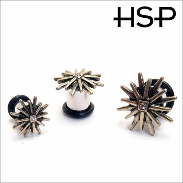 トライバルサンデザインが存在感抜群のシングルフレア イヤレット。シンプルな筒状デザインで片側をゴムで留めるタイプです。ラージホール(ハイゲージ)の方のアクセントやワンポイントにぴったり！耳元にインパクトが欲しい方におすすめのボディピアスです...