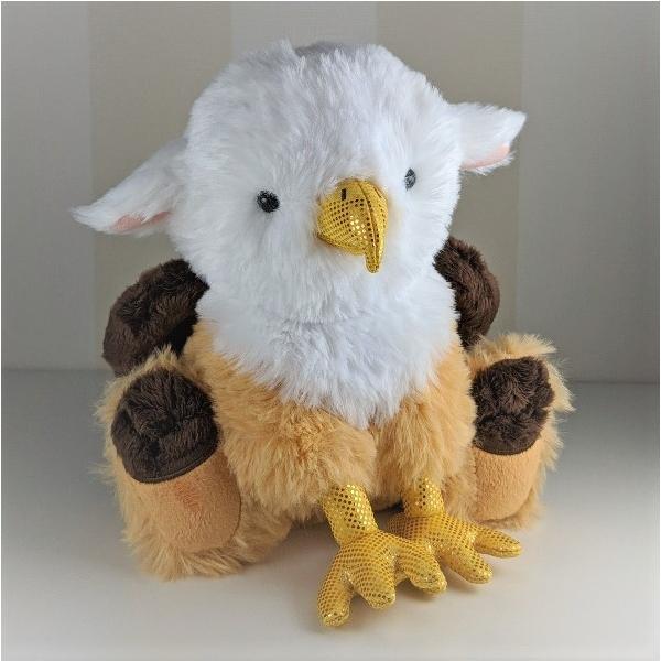 サイズ：H20W18D16(cm)（奥行は尻尾含まず）ファンタジー世界の動物、グリフォン。頭がワシで体がライオンの不思議な幻獣です。グリフォンのひなをイメージして可愛らしくデザインしました。ありそうであまりないぬいぐるみを作ってみたいと始め...