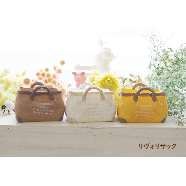 レジン製ガーデンポット商品名：　リヴォリサックサイズ：W75×L60×H50mm内径 W60×L38mm材質：レジン穴あり●小さなカケや塗装の剥がれ、色ムラがあり仕上がりに個体差があります●画面上の色は、OS、ブラウザ等のパソコン環境により...