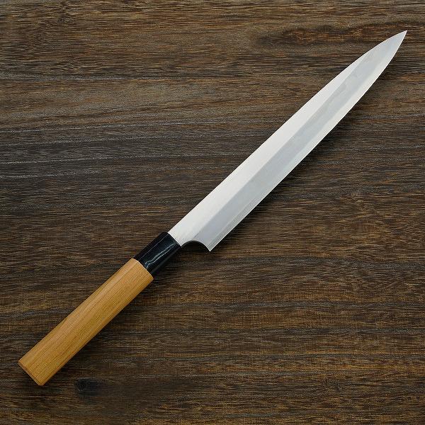 製品仕様■サイズ：全長約410mm刃部 刃渡り約270mm 刃幅約34mm(刃元) 刃厚約3.5mm柄部 長さ約138mm 幅約25mm(最大) 厚み約21mm■重量：約175g■材質：刃部 切刃 青紙2号柄部 桜口輪 プラスチック■刃の形...