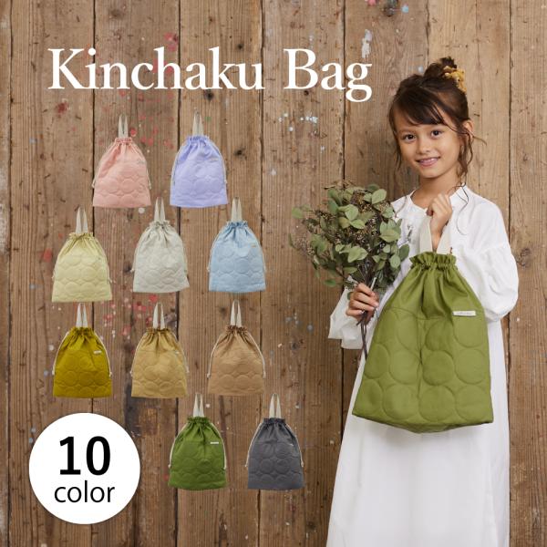 オールハンドメイドの日本製 cheeks のサークルキルト 巾着バッグです。軽くて持ちやすくかわいいシンプルなデザイン。自然な風合いの生地にまるいステッチがかわいい。肌ざわりが優しく、ふわふわなサークルキルト生地です