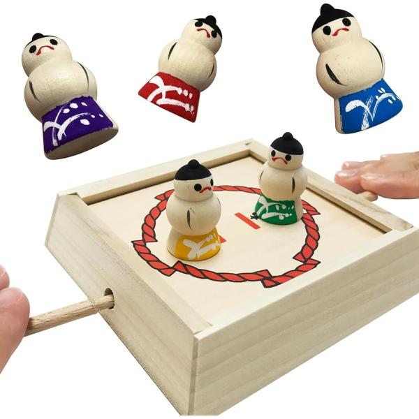 バリエーションコード : 2B6SKL0G10・「昔懐かし民芸玩具」なつかしさが漂う、木製おもちゃです。土俵穴からでた木の棒を、指で叩いて「トントントン」。土俵の力士が右へ左へ動きます。2人で楽しめるレトロな卓上ゲームです。・「上手にできる...