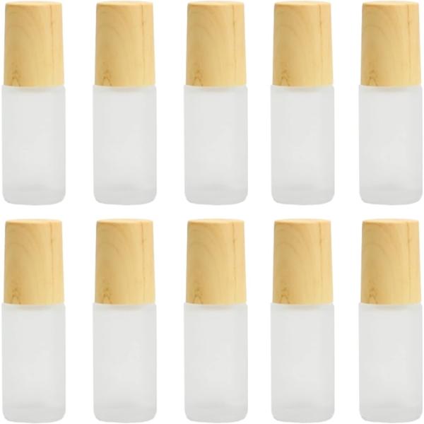 バリエーションコード : 2B4NI35NUI「木の蓋が可愛いアロマボトル」木目調のふたが可愛い持ち運び用のロールオンボトル10本セットです。持ち運びに便利なサイズで、キャンピング、出張や旅行などの際に携帯して頂けます。旅行の際のポケットや...