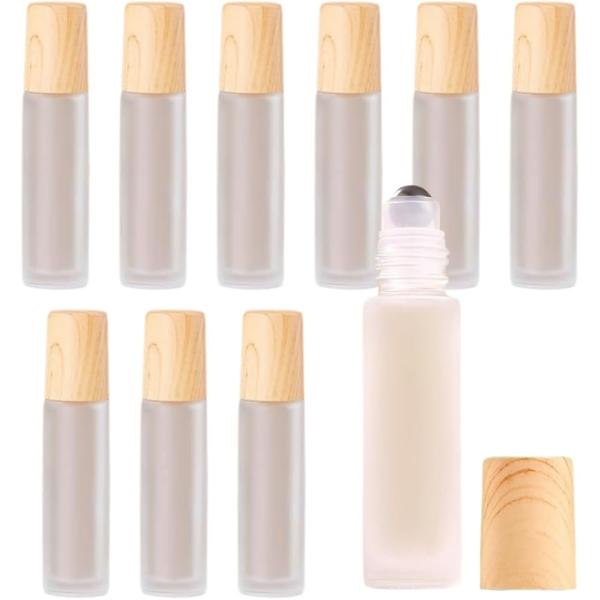 バリエーションコード : 2B9J23KUX9「高機能でおしゃれ」10本セットの透明ガラス製ロールオンボトルは、木目調の蓋でスタイリッシュなデザイン。先端にステンレス製のスチールボールを搭載したロールオンボトル。香水やアロマオイルをムラなく...