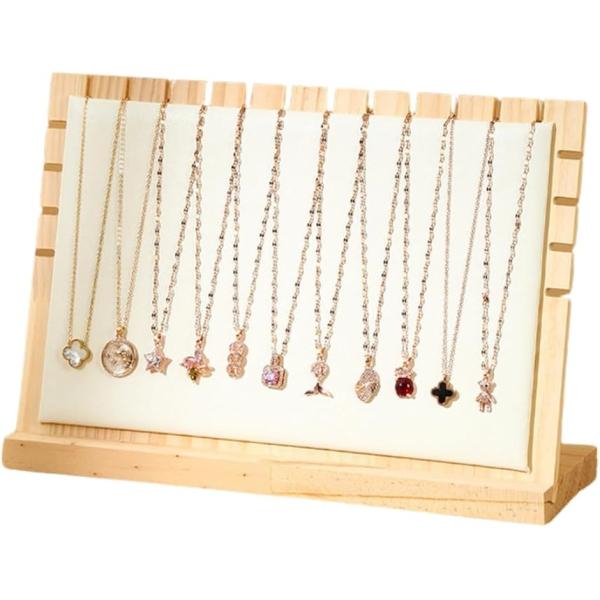バリエーションコード : 2B9NDFTCLH「ネックレス収納に便利」収納時に絡まりがちなネックレスをストレスフリーで収納できるネックレススタンド。スタンドの溝にネックレスをかければ見栄え良く、綺麗に収納可能です。ボードは約22cmの長さが...