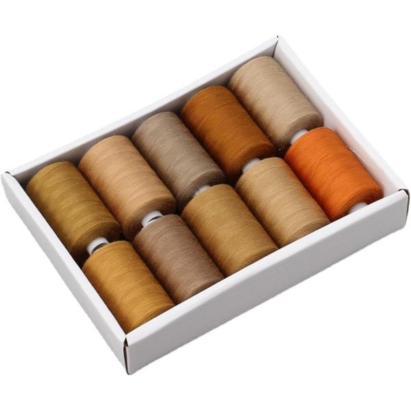 このポリエステル製の糸は、10巻セットで合計9000mもの長さがあり、オレンジ、ブラウン、ベージュ系の暖色10色セットです。布地に合わせやすく、大物制作やたくさん使う方におすすめです。家庭用ミシン糸の定番である60番の糸は、幅広い布地に適し...