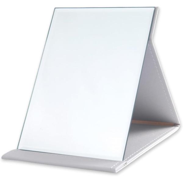 バリエーションコード : 2B9V9D89XH「スタンド付きのLサイズ卓上ミラー」25x18cmのちょっと大きめなサイズで、スタンドが付いています。置くだけで安定感があり、手を使わずにご使用できます。ホワイトとブラックのデザインはシンプルで...