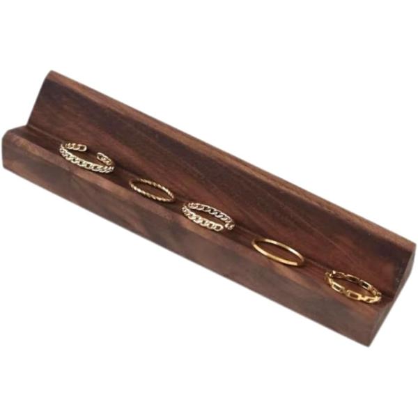 バリエーションコード : 2B9WXSNVHG「木製リングスタンド」木目が美しい木製のリングスタンドです。クルミ（ウォールナット）の深い色のリングホルダーなのでアクセサリーが映えます。しっとりとした質感で、どんな店舗やインテリアにもなじみま...