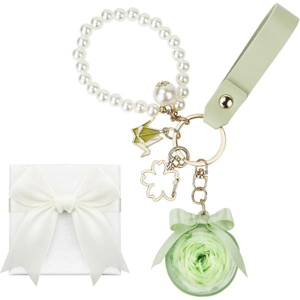 バリエーションコード : 2B9T0K2V6Q「女性 プレゼントに最適」ミニプリザーブドフラワー キーホルダーは、淡く優しい色合いのプリザーブドローズを中心に、華やかなお花を散りばめ愛情を感じるカラフルなデサインに仕上げました。特徴は、生花...