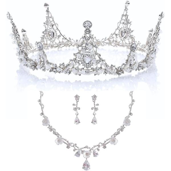 バリエーションコード : 2BJ0D8PWJ3「デザイン」大ぶりのラインストーンと繊細なビーズの装飾をあしらったクラウンティアラです。誰もが憧れる王冠の形のティアラとして人気があります。存在感があるのでシンプルなヘアスタイルやドレスに特に映...