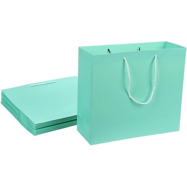 バリエーションコード : 2BJDTCFL18ギフトバッグ、ショップバック、サブバッグにおすすめの紙袋10点セットです。誕生日プレゼント、お土産、お店の商品やカタログなど様々なシーンでお使いいただける横型手提げ袋です。高級板紙であるアイボリ...